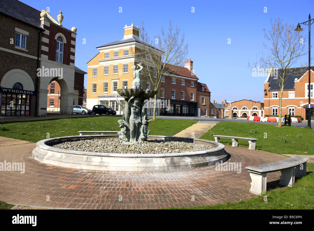 Poundbury Village square with it s water fountain and sculpture Stock ...