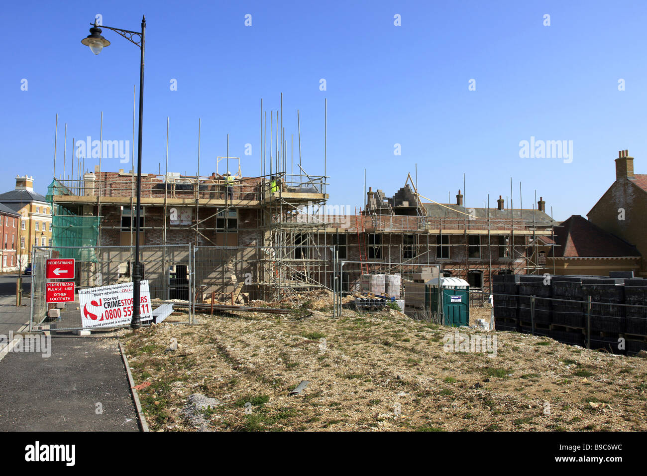 Housing construction site with little or no work being done by the ...