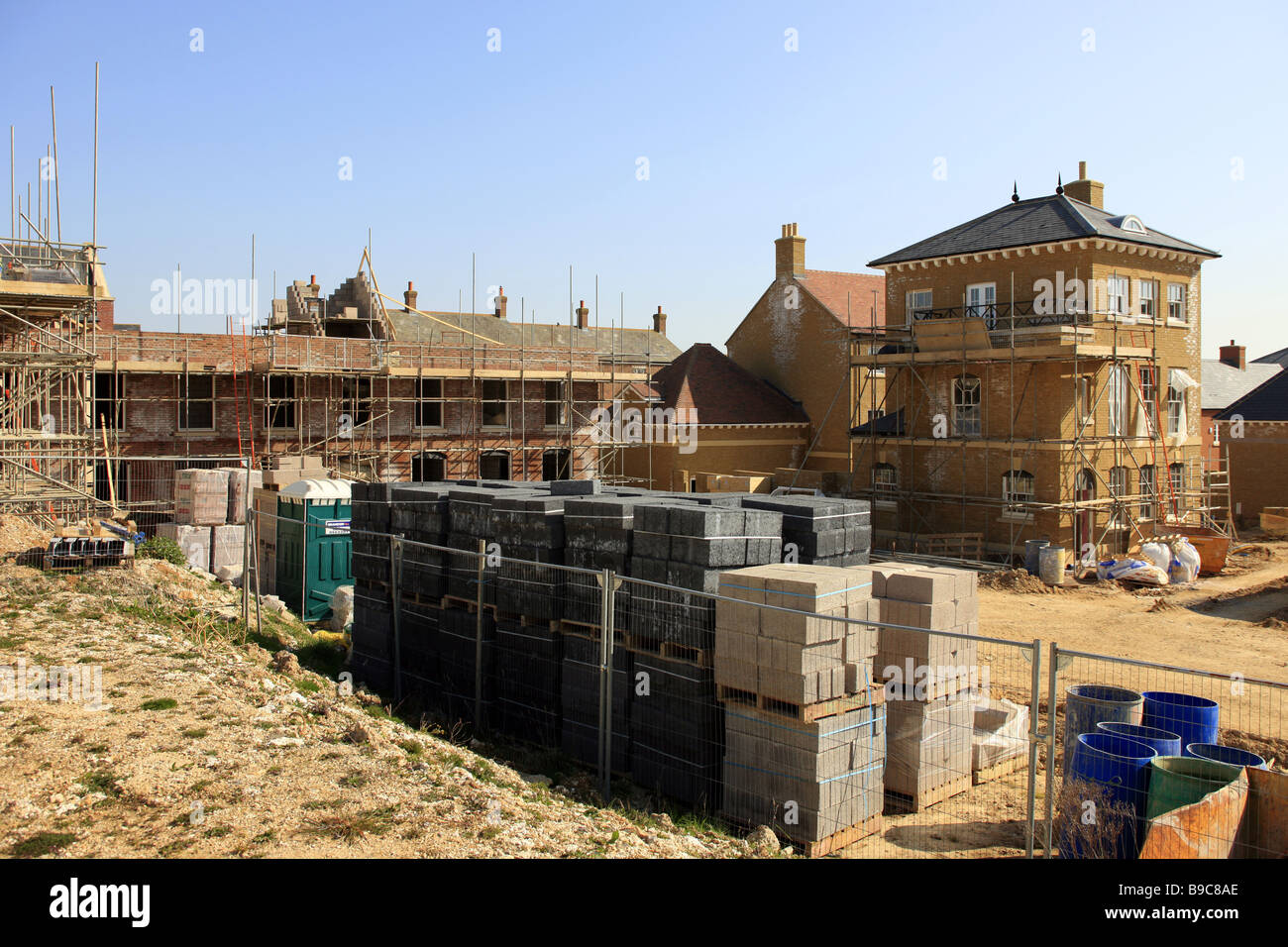 Housing construction site with little or no work being done by the ...