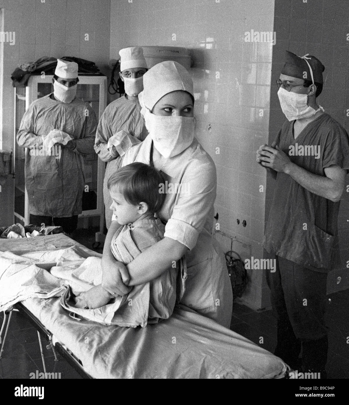 Doctors ready child for operation at Filatov clinical hospital for ...