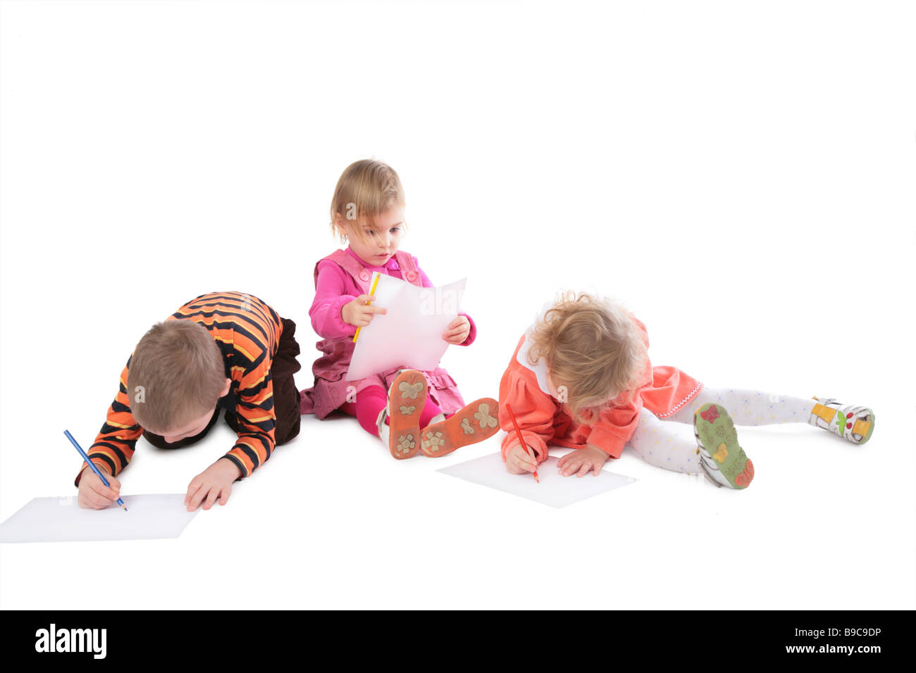 Three children drawing 2 Stock Photo - Alamy