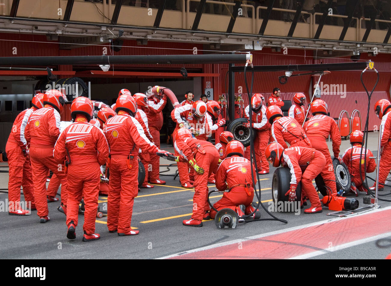 Ferrari crew ready for pitstop at Formula 1 testing sessions on the ...