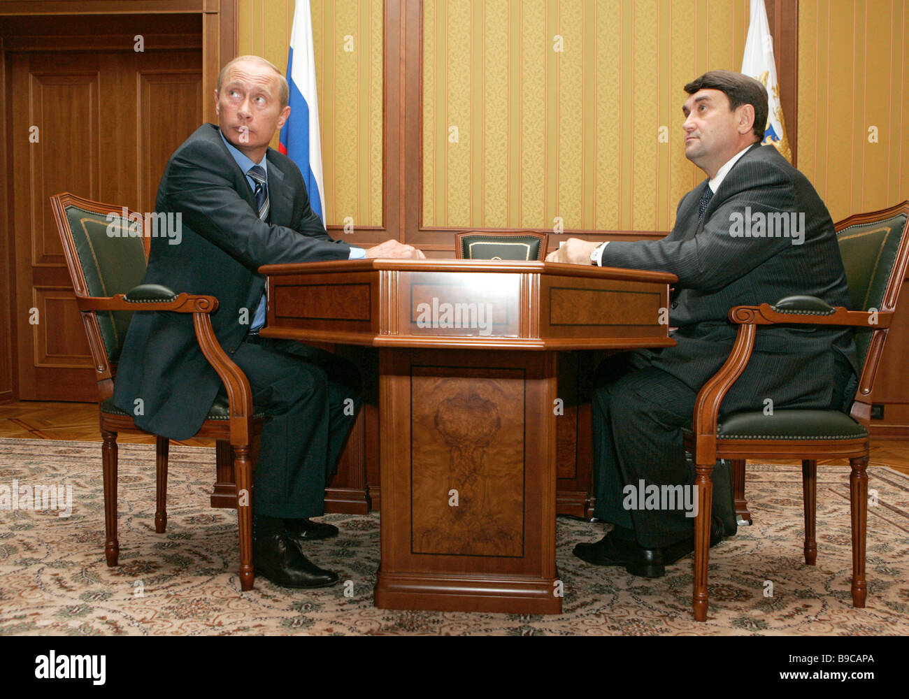 President Vladimir Putin and Transport Minister Igor Levitin left to ...