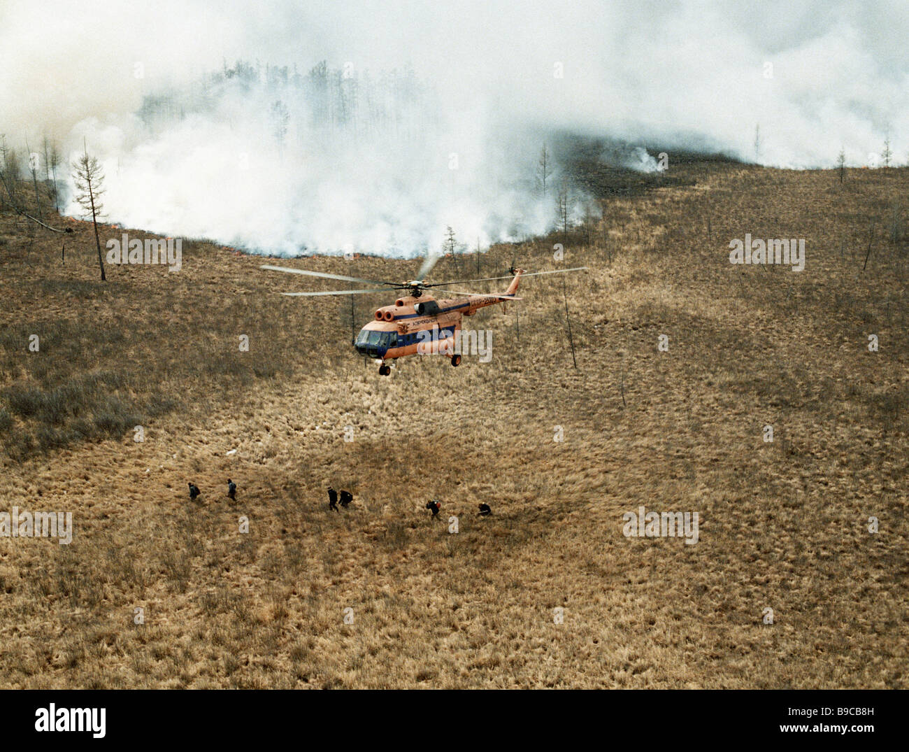 Forest rescue service liquidating fire sources in the taiga Lake Baikal ...