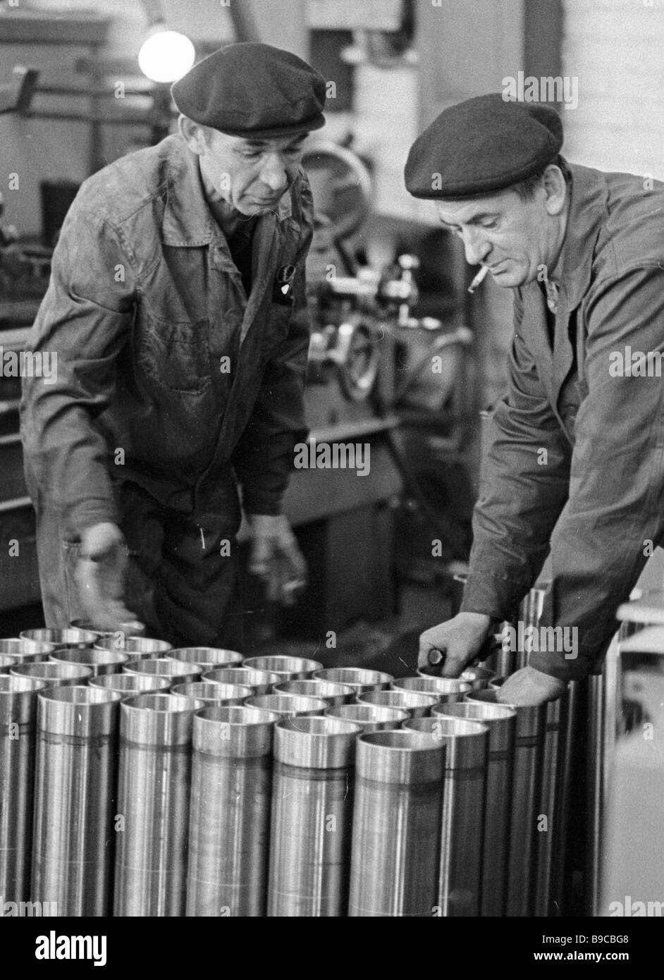 Bearer of the Order of Lenin turner Nikolai Yevdokimov left and Hero of ...