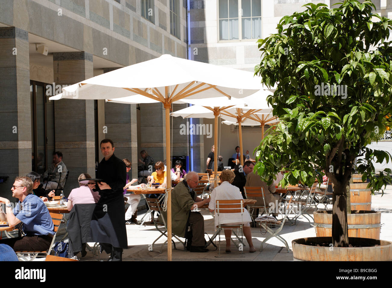 Guests resting in the cafe of the Museum of Art Basel Canton Basel ...