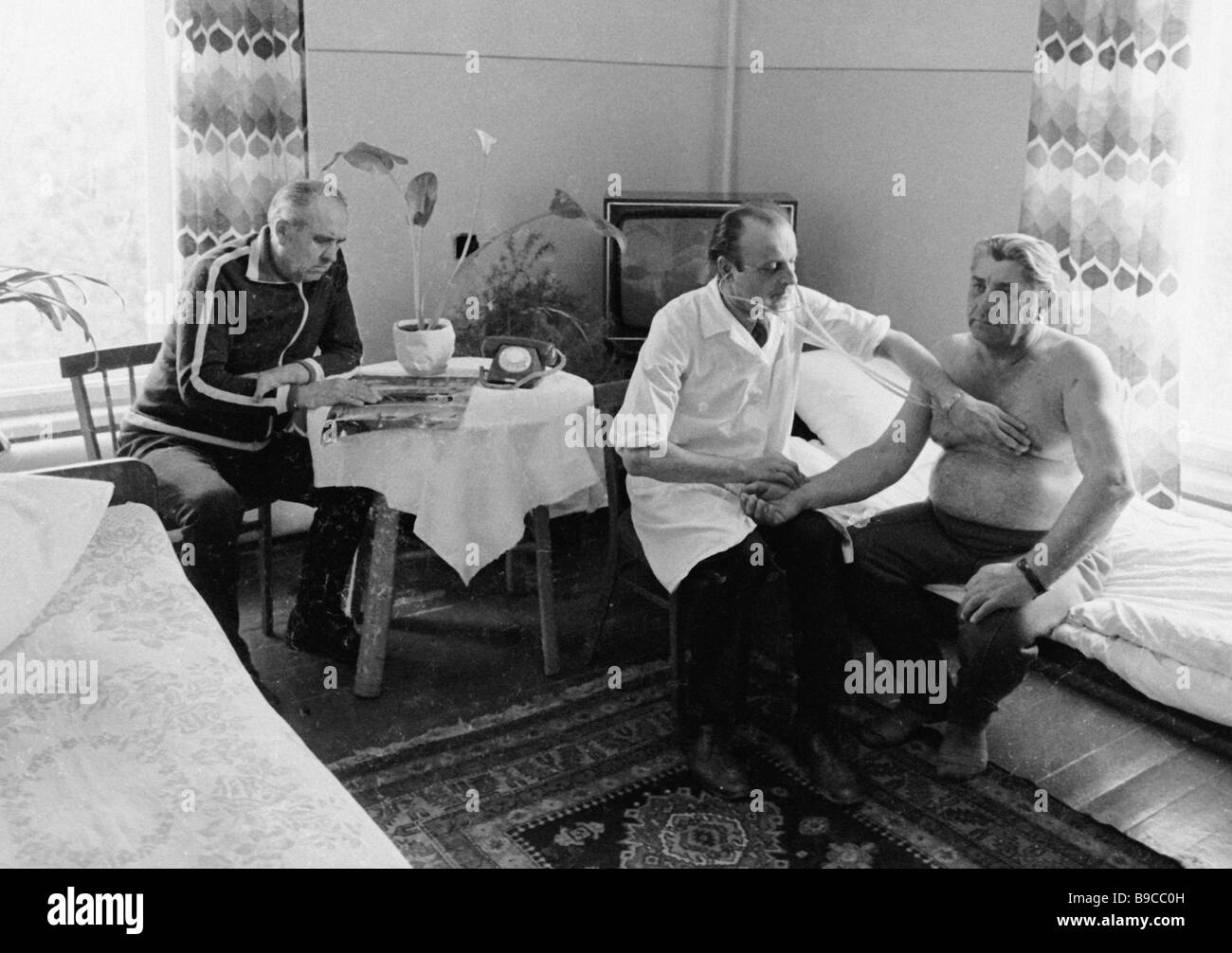 A doctor making daily morning round examining patients in World War II ...
