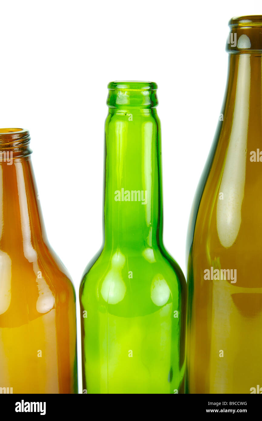 Empty beer bottles isolated against a white background Stock Photo - Alamy