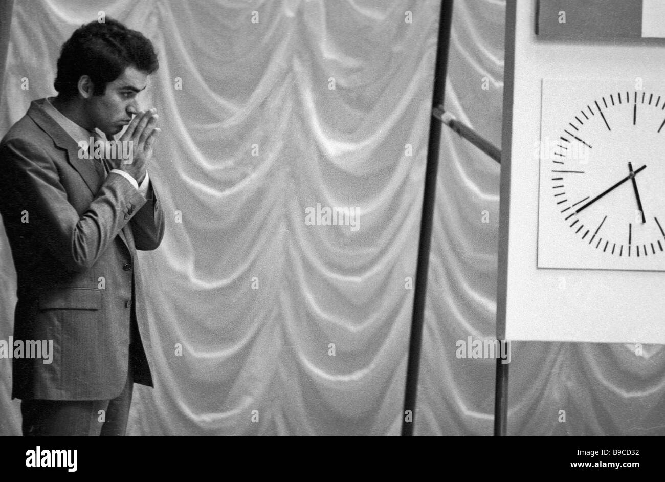 Gary Kasparov world chess champion ponders at his next move in a return ...