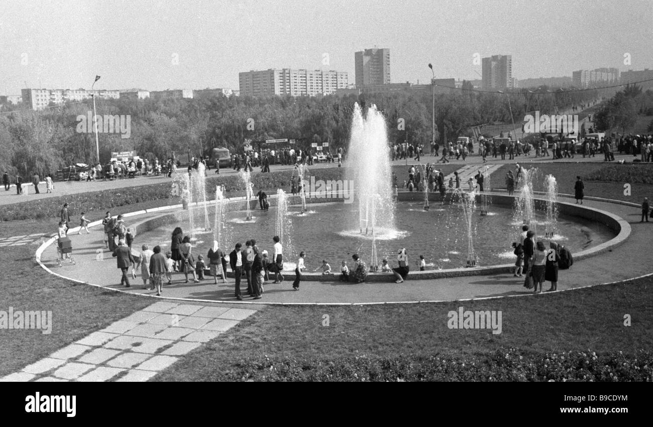 Donetsk citizens at a fountain in the Yubileiny Jubilee park Stock ...