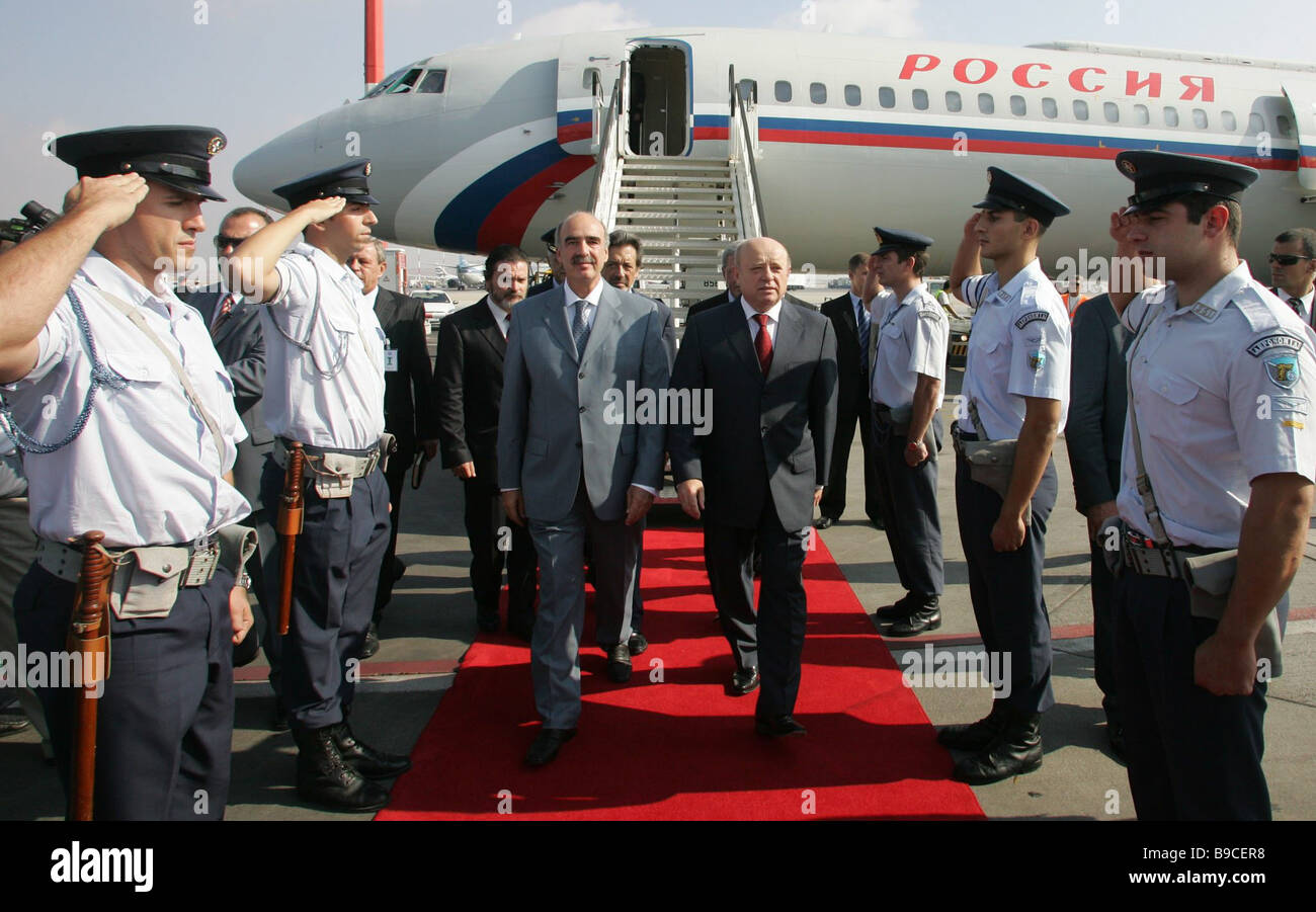 Russian Prime Minister Mikhail Fradkov center right arriving on an ...