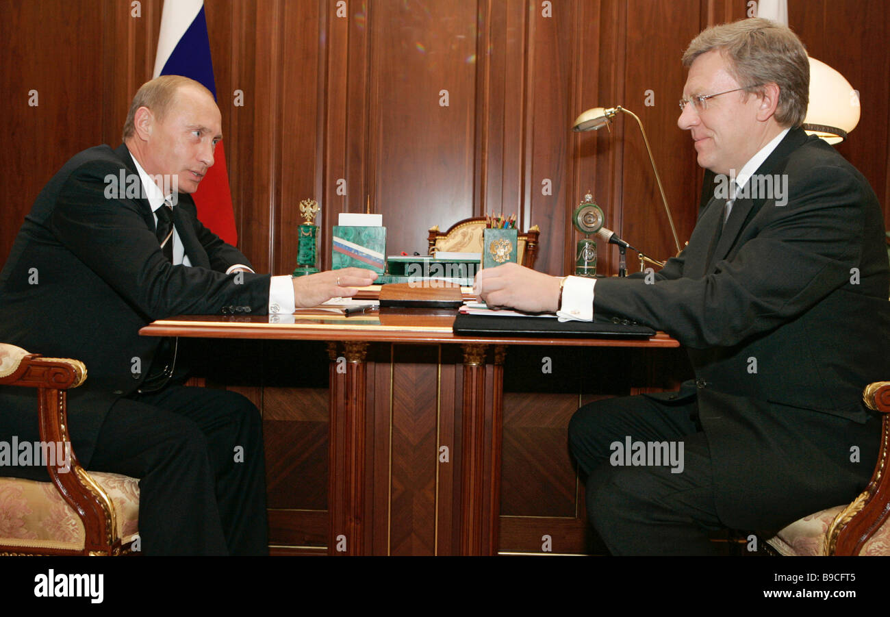 President Vladimir Putin and Finance Minister Alexei Kudrin left to ...