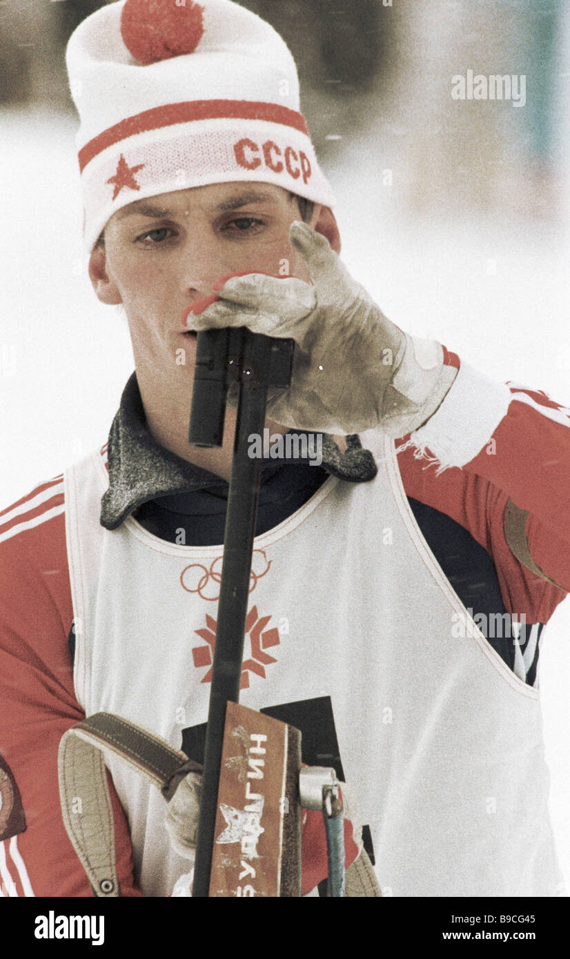 Soviet athlete Sergei Bulygin takes part in biathlon relay race during ...