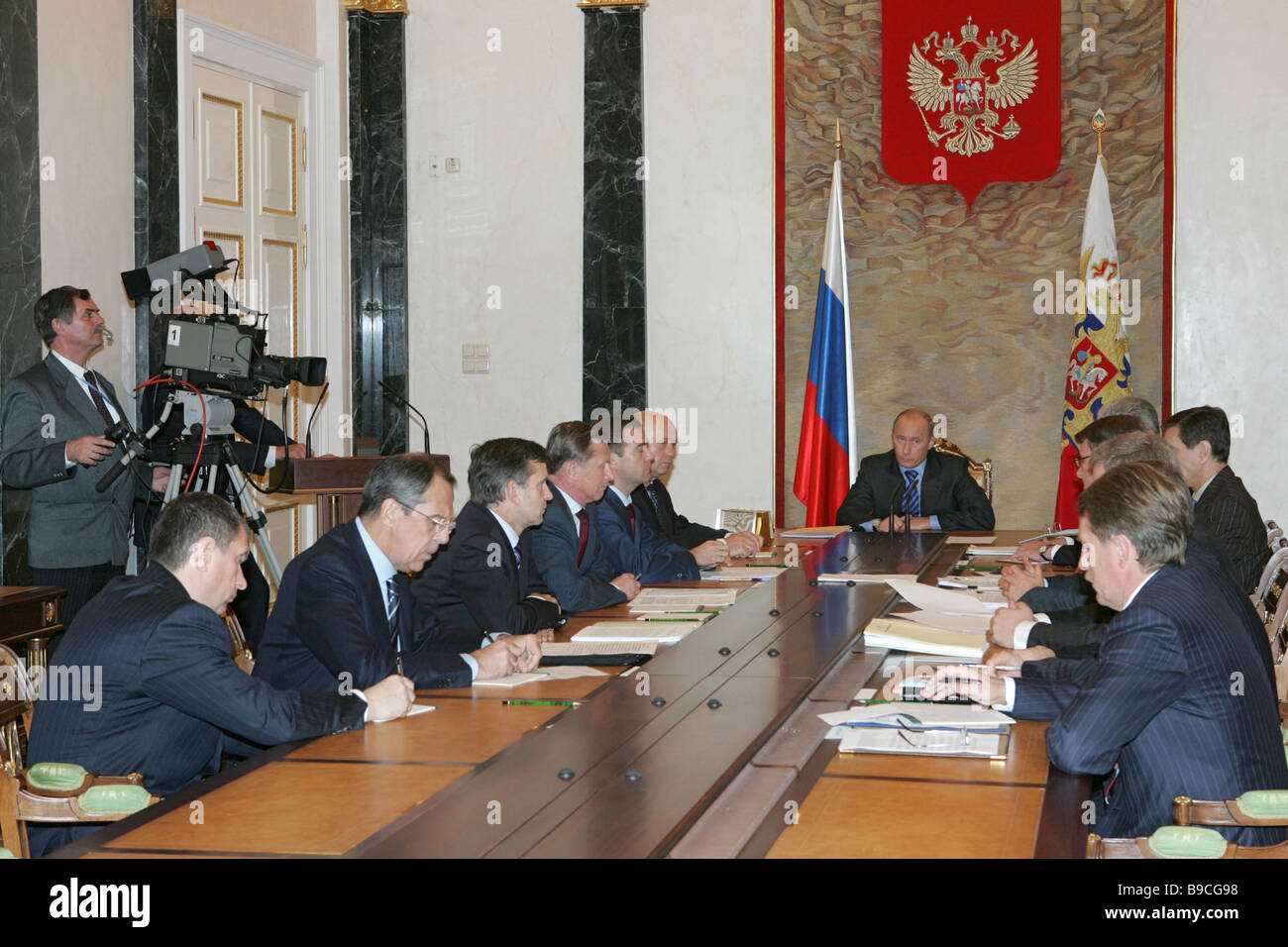 President Vladimir Putin center during a Cabinet meeting in the Kremlin ...