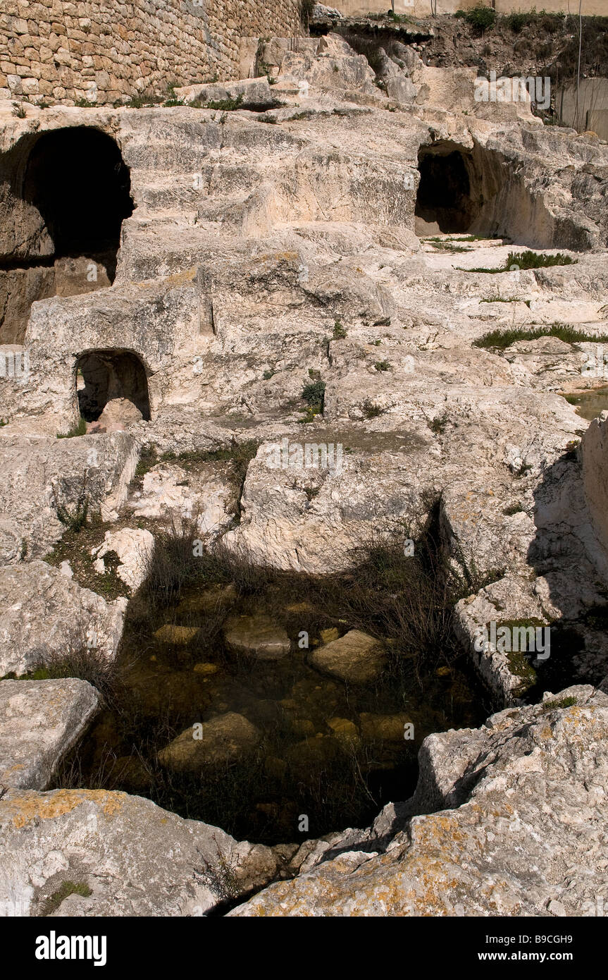 Ancient rock-cut tombs near Pool of Siloam or Shiloah that was fed by ...