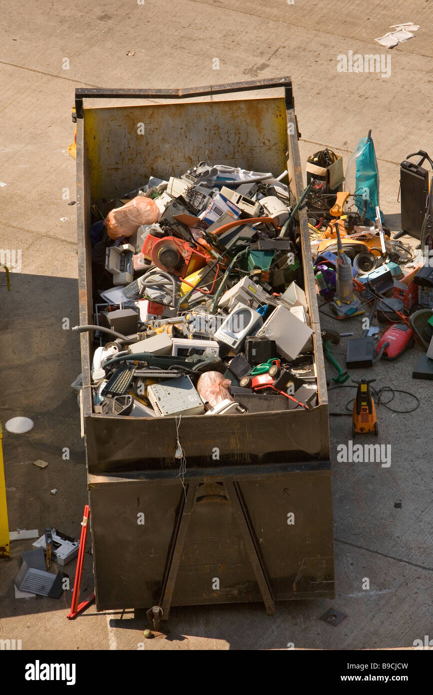 Skip or dumpster full of electrical goods Stock Photo - Alamy