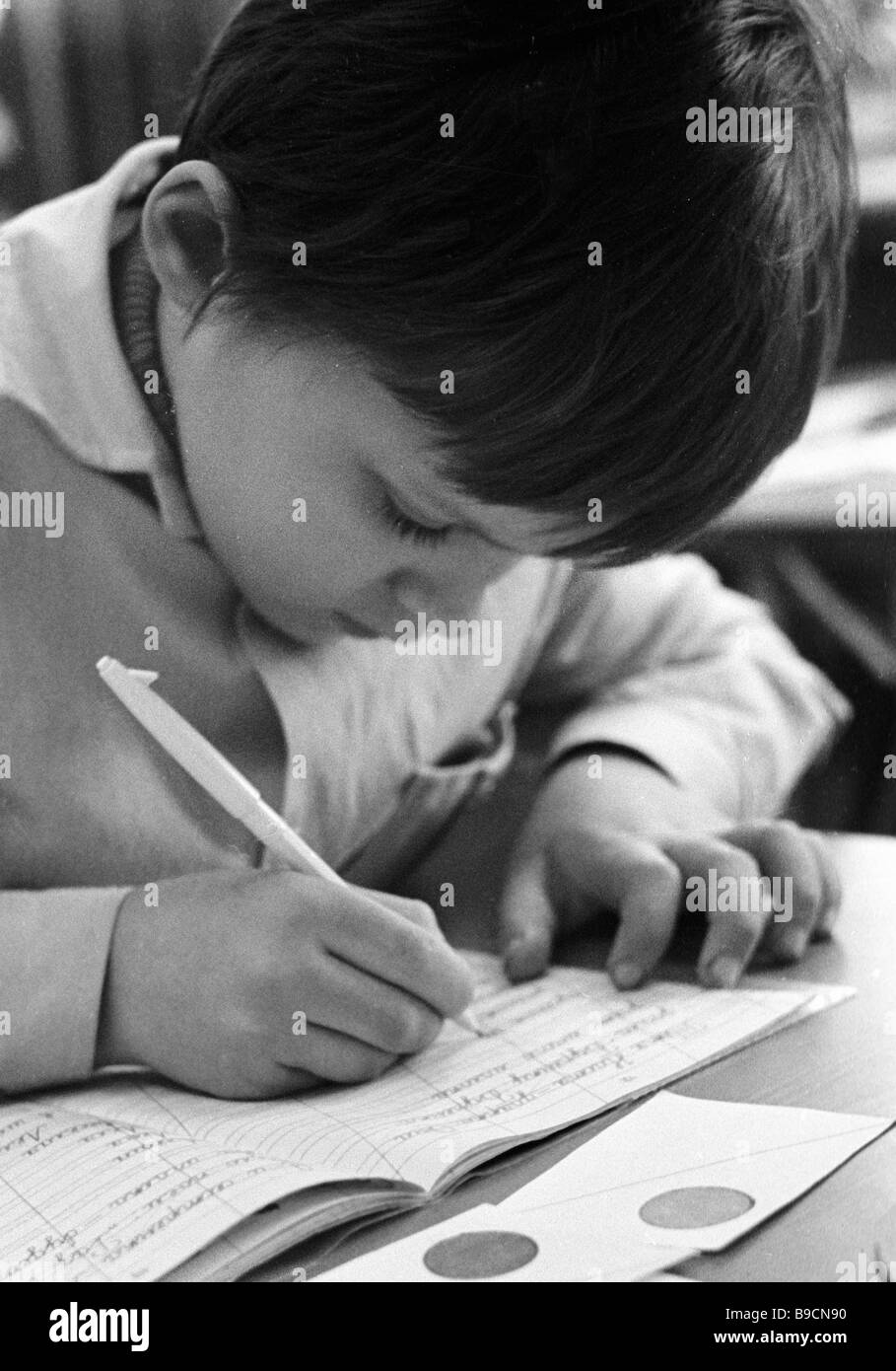 Writing class at primary school Stock Photo - Alamy