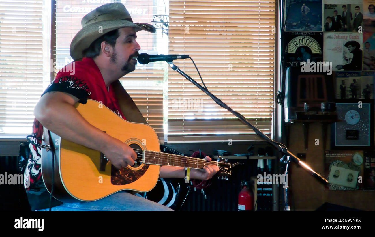 Country music acoustic guitarist sings Broadway bar Nashville Tennessee ...
