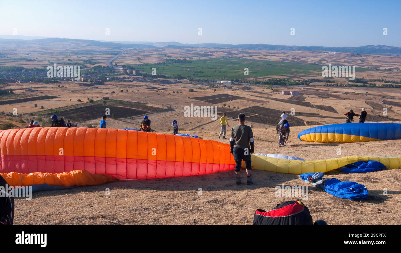Paraglider pilots at takeoff Inonu Eskisehir Turkey Stock Photo - Alamy