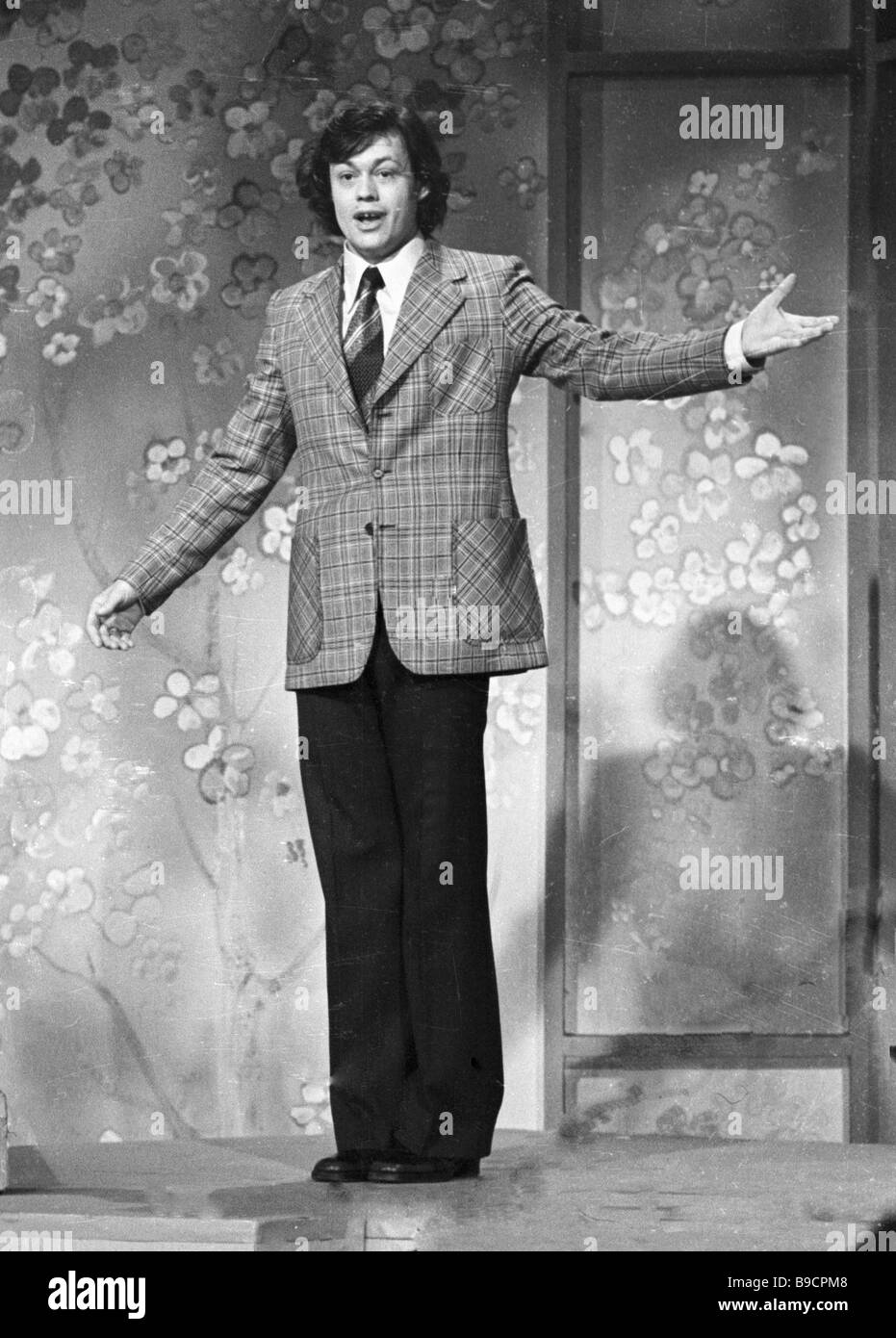The actor of the Lenin Komsomol Theater Nikolai Karachentsov presenting ...
