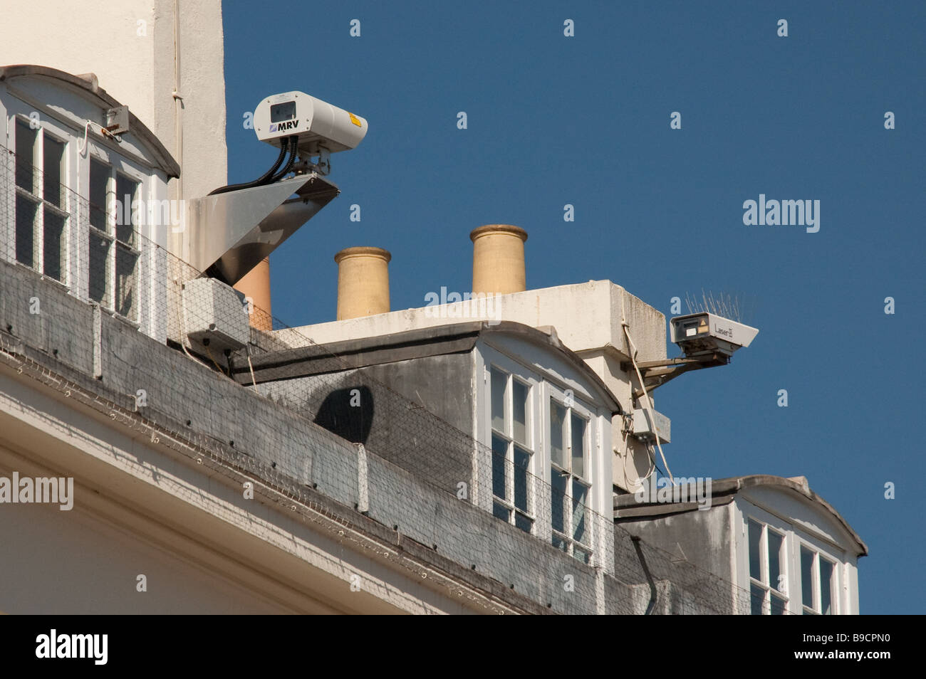 Security cameras keep watch Stock Photo - Alamy