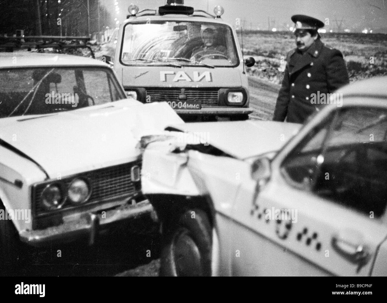A traffic police officer inspecting the place of the accident Stock ...