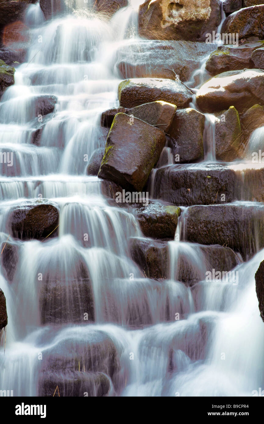 Scenic waterfall with water flowing over rocks Stock Photo - Alamy