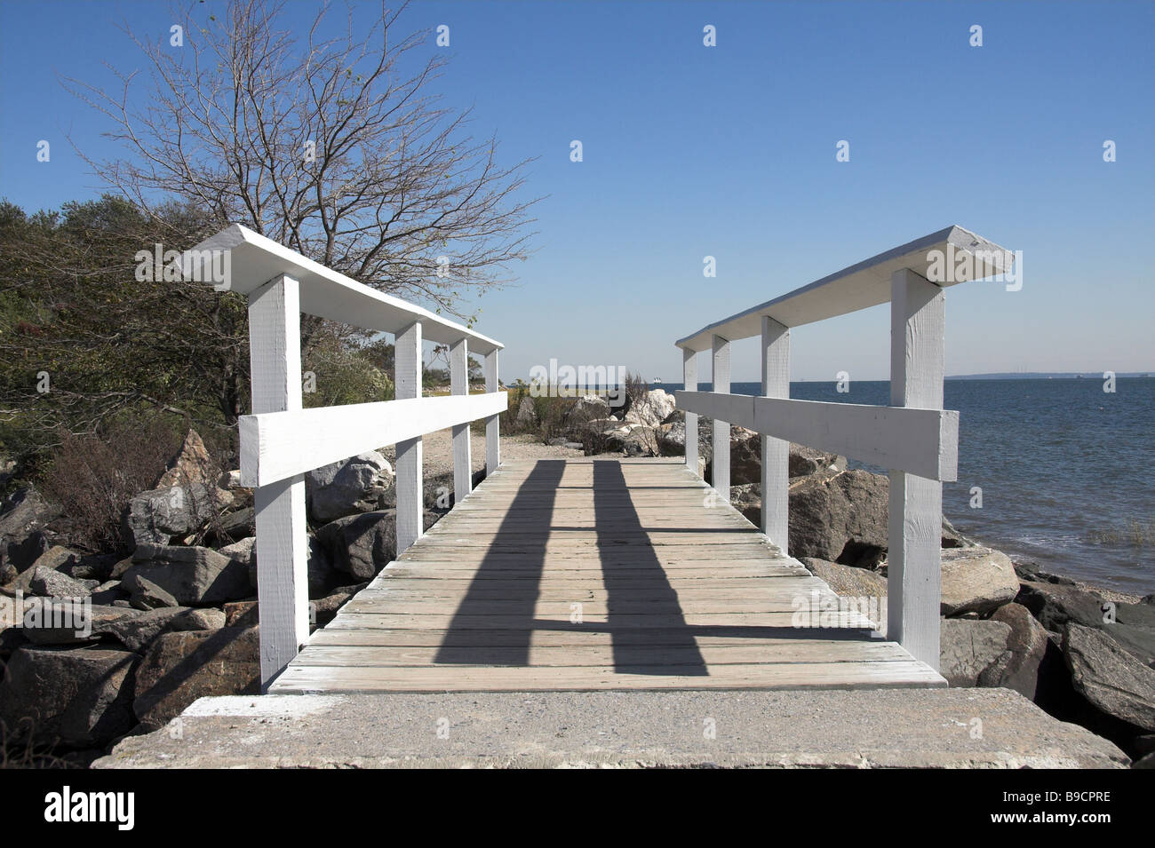 Ols wooden beach bridge Stock Photo - Alamy