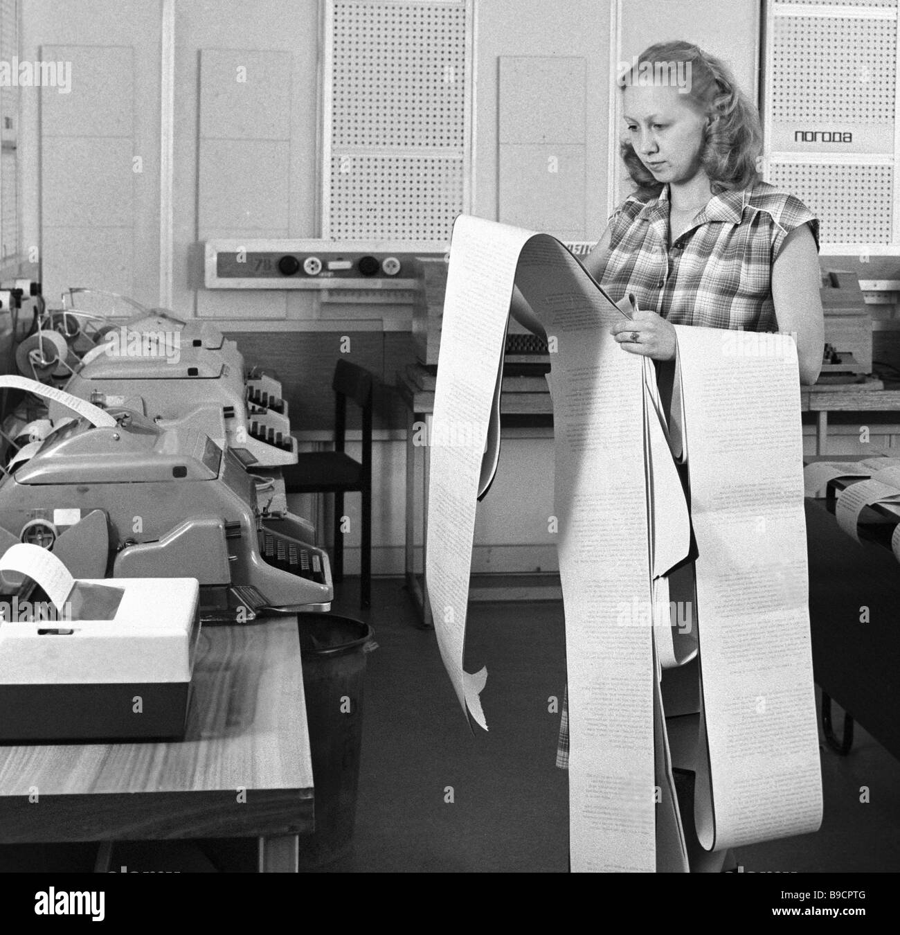 Issuing editor in teletype room Stock Photo - Alamy