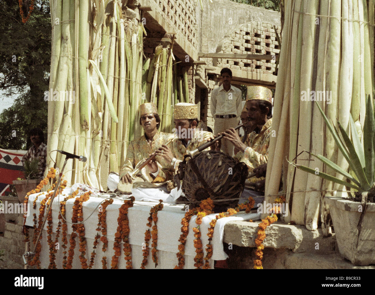Indian musicians playing folk instruments in an old quarter of New ...