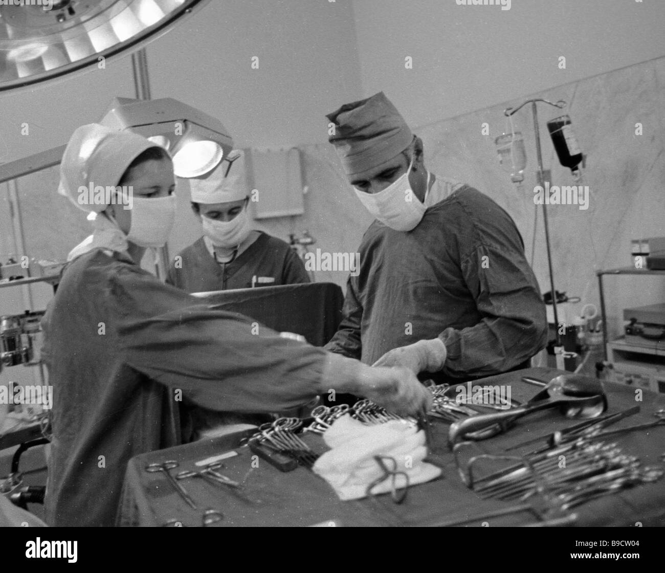 Soviet surgeon Nigmat Khidoyatov in the operating room of Uambo central ...