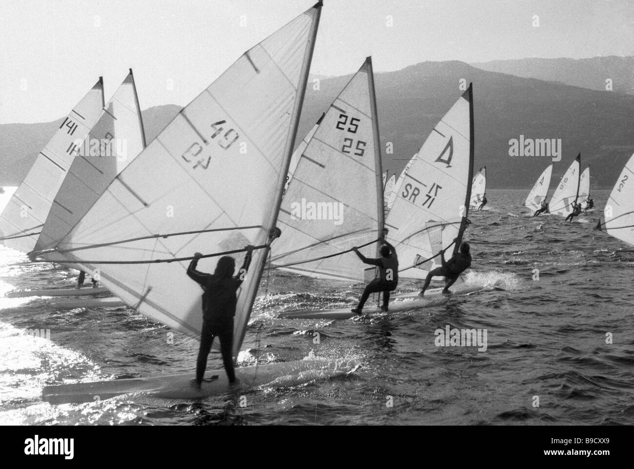 Wind gliders going on their marks at the sailing regatta in Yalta Stock ...