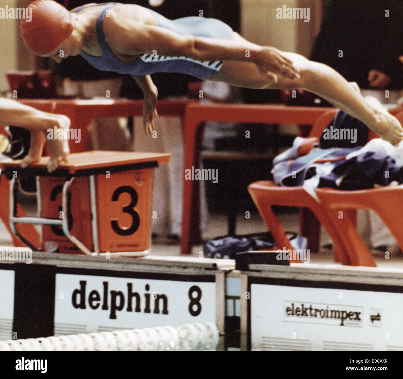 Swimming athlete jumping Stock Photo - Alamy