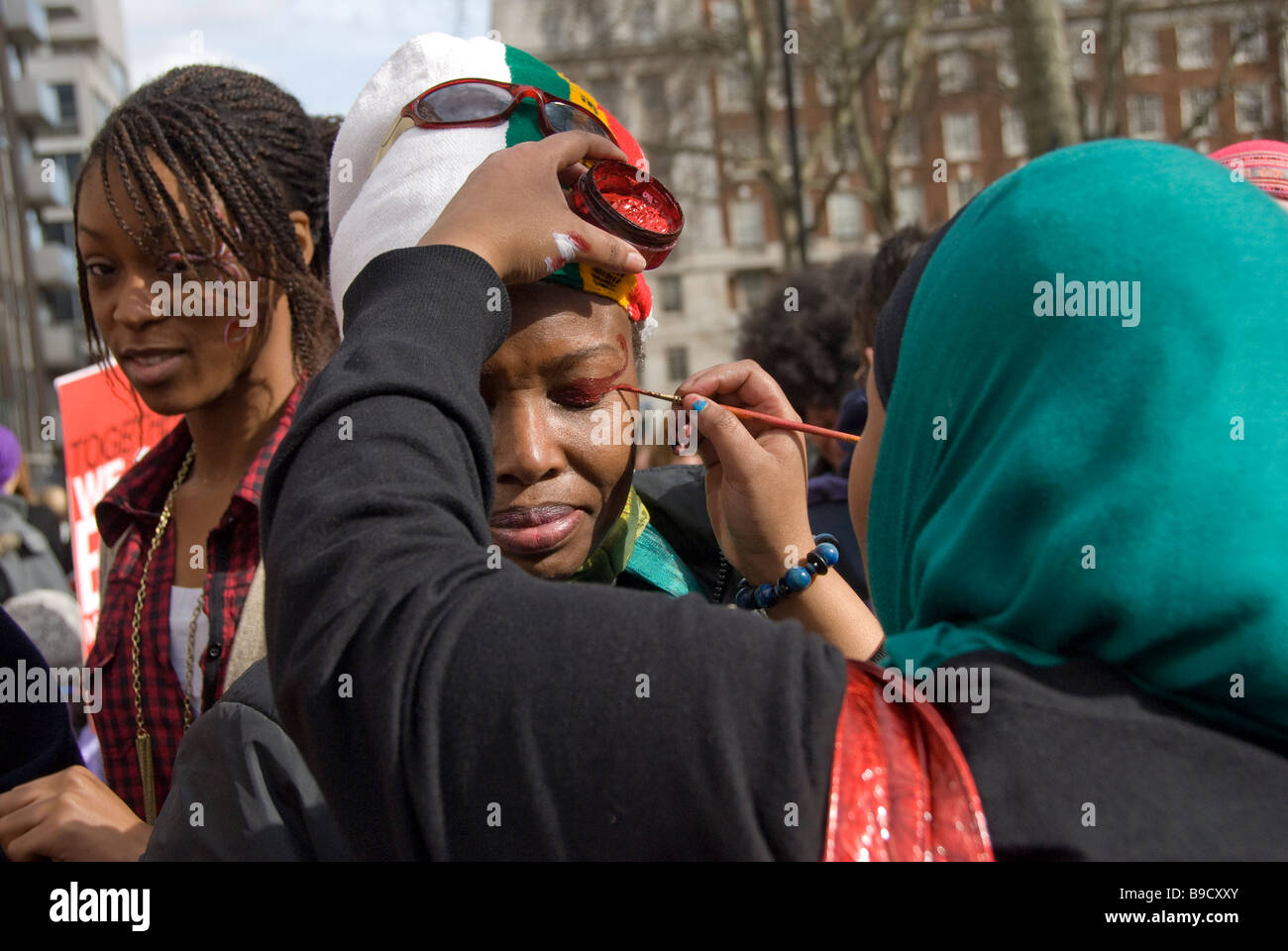 women face painting for protest Stock Photo - Alamy