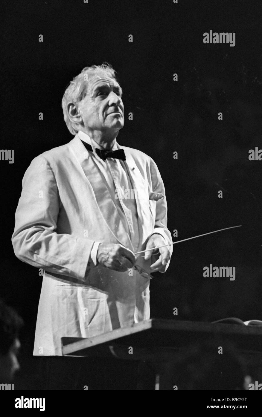 Outstanding American composer and conductor Leonard Bernstein standing ...