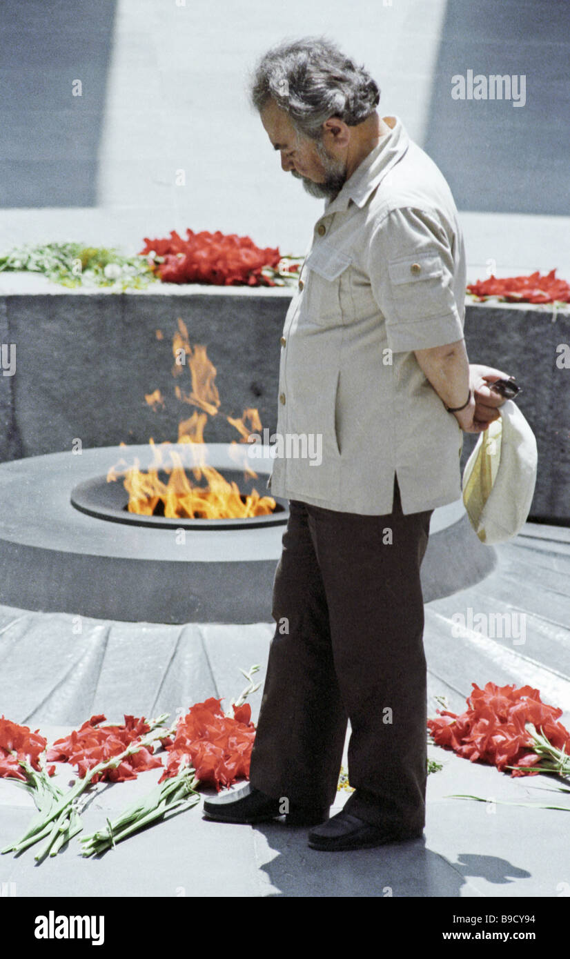 Armenian poet Gevorg Emin at the monument to victims of the 1915 ...