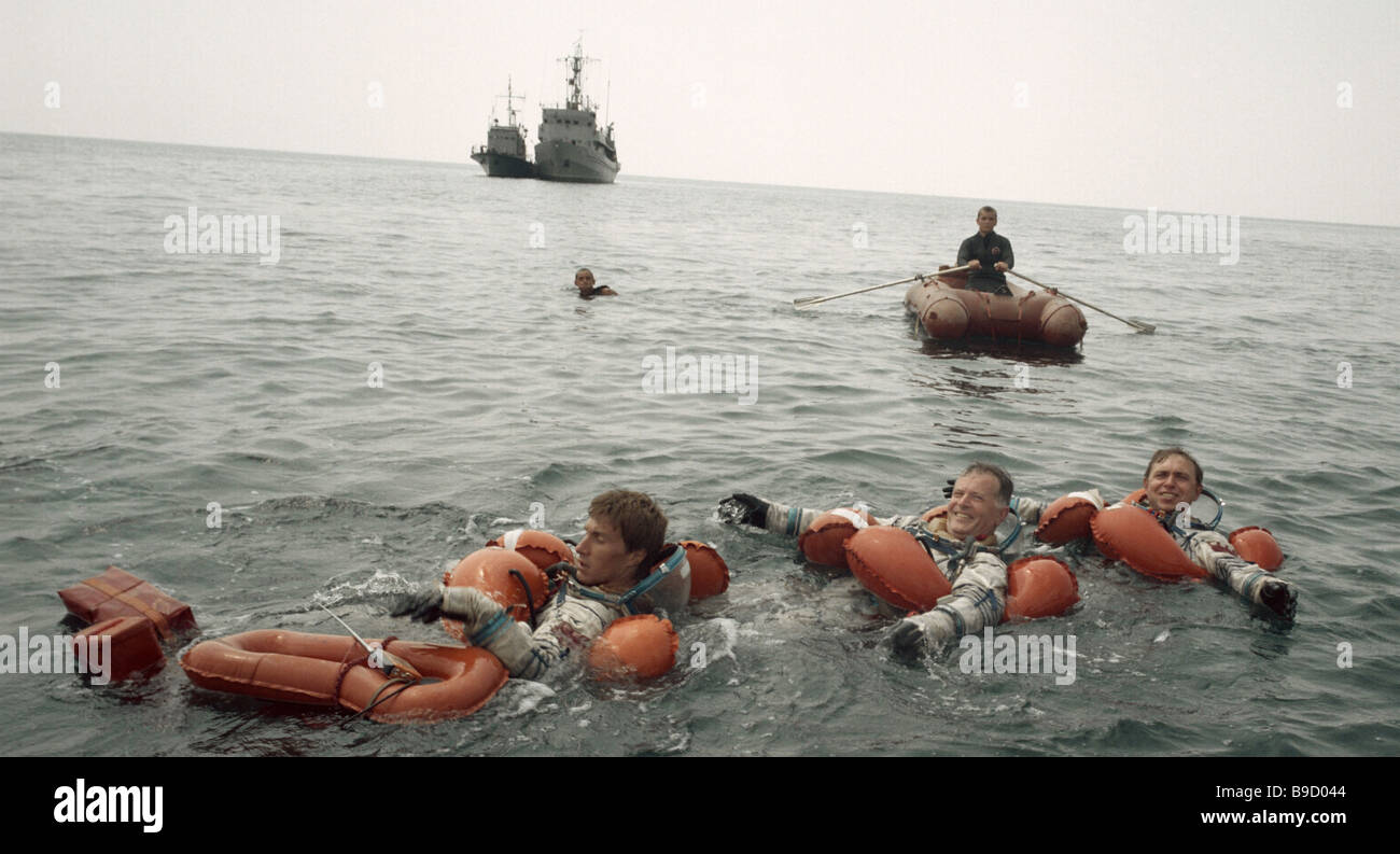 Soviet and French cosmonauts during water landing training before the ...