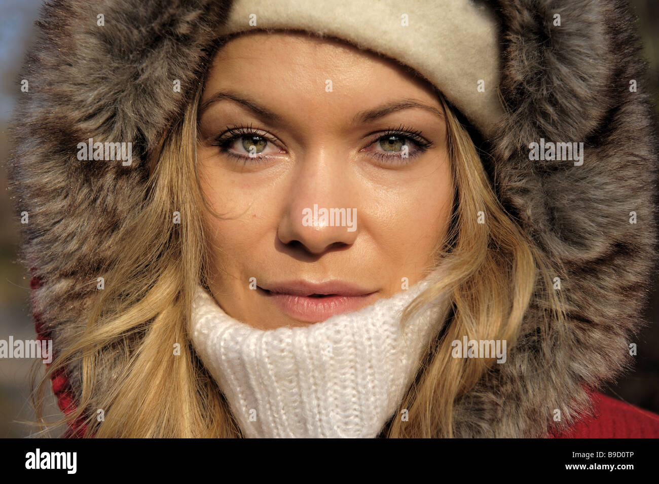 Beautiful Woman keeping herself warm Stock Photo - Alamy