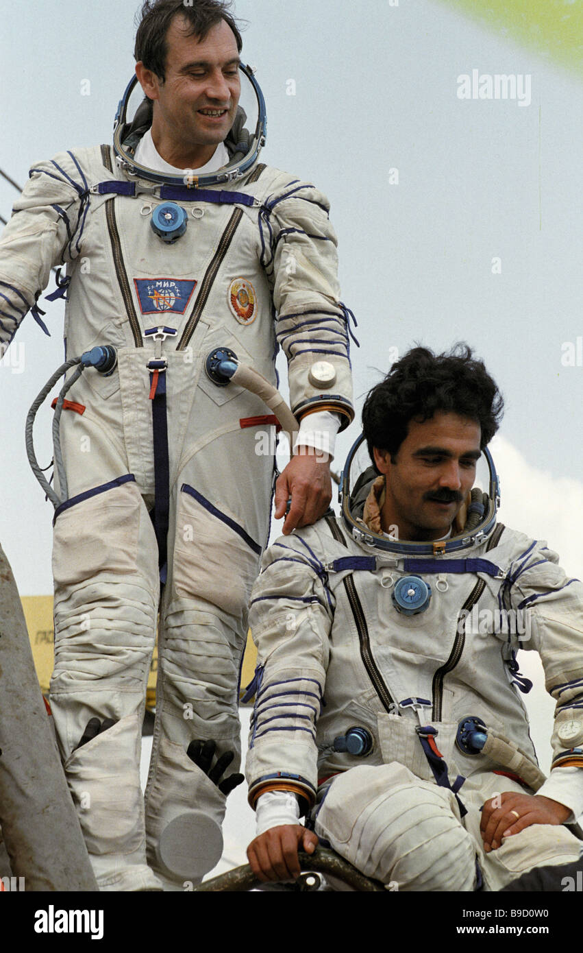 Physician Valery Polyakov left and Researcher Cosmonaut of the Republic ...