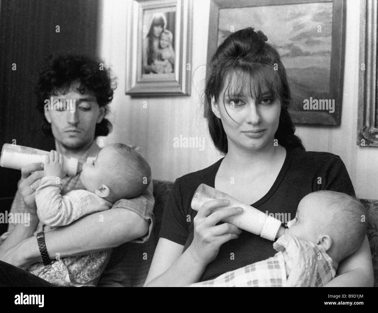 Artists Ivan Petkov left and Irina Razheva right feeding their ...