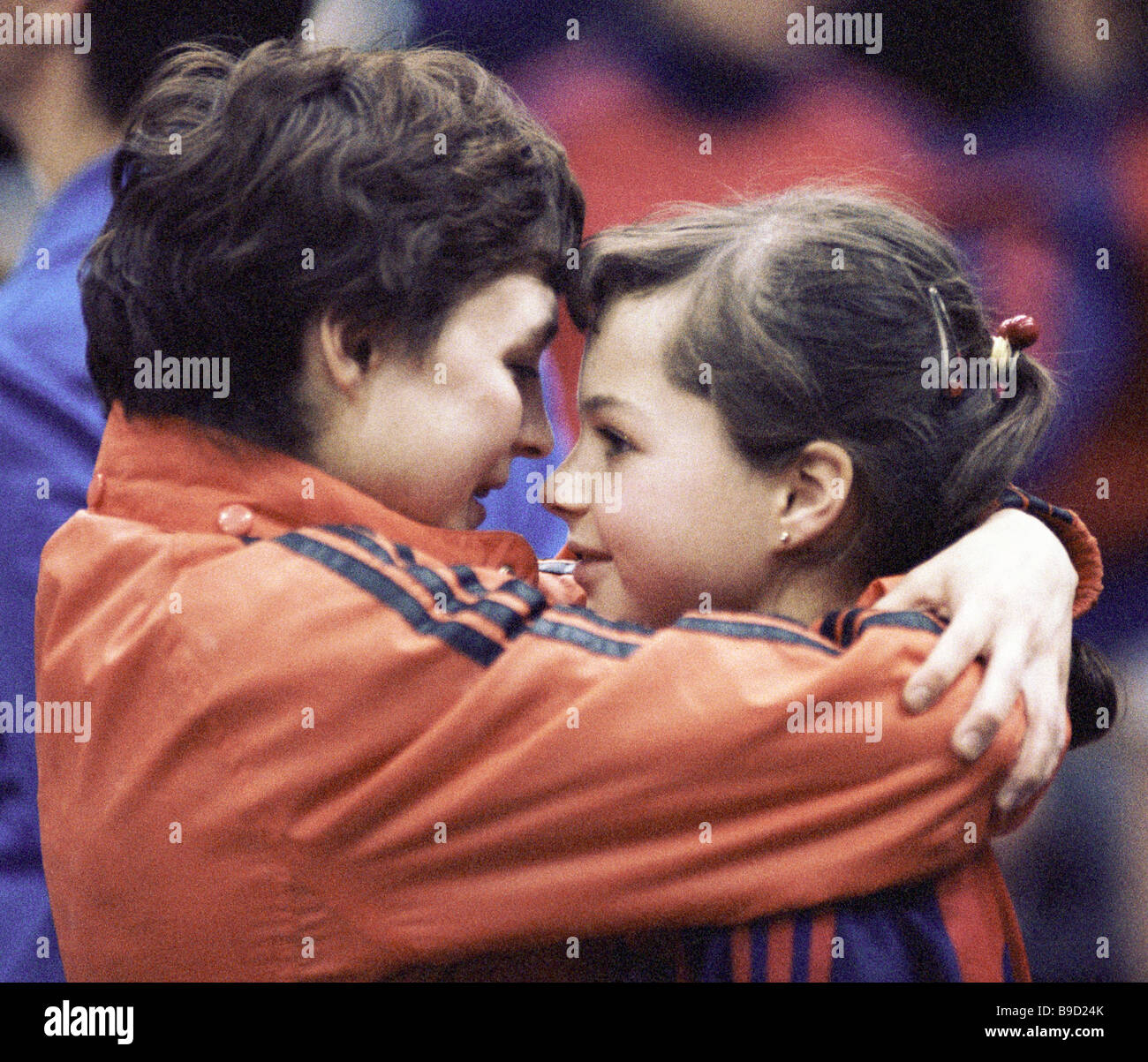 Two time Olympic gymnastics champion Maria Filatova left congratulates ...