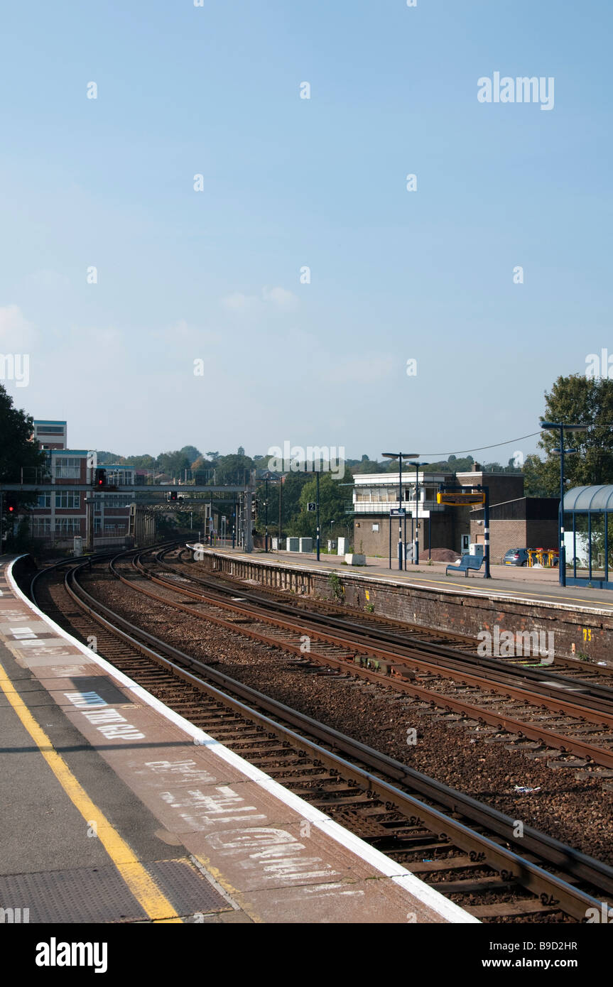 A view of the tracks in a train station Stock Photo - Alamy