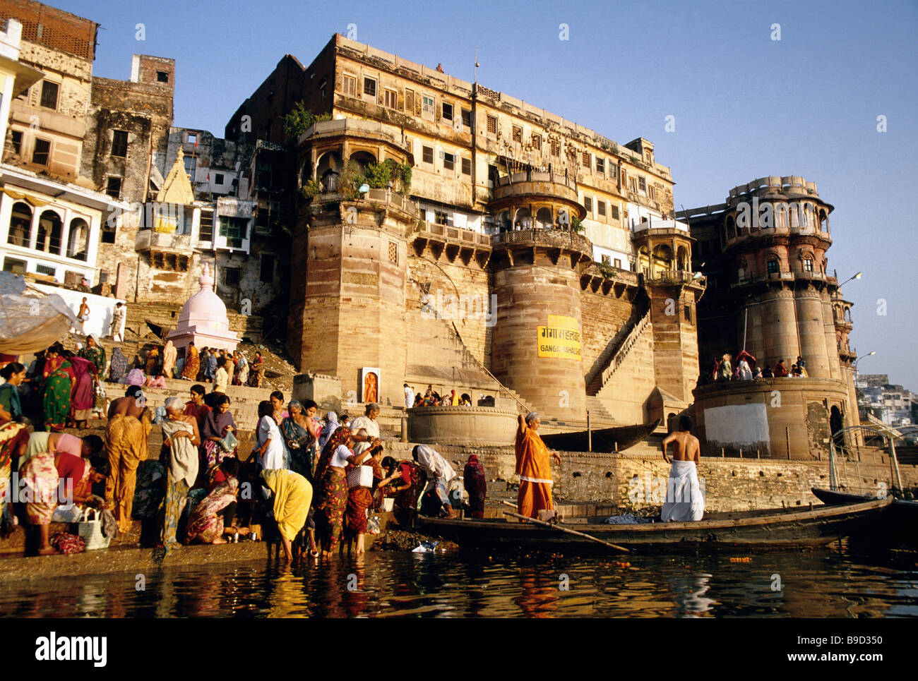 Varanasi (Benares), Pilgrims on Ganga Mahal Ghat along sacred Ganges in ...