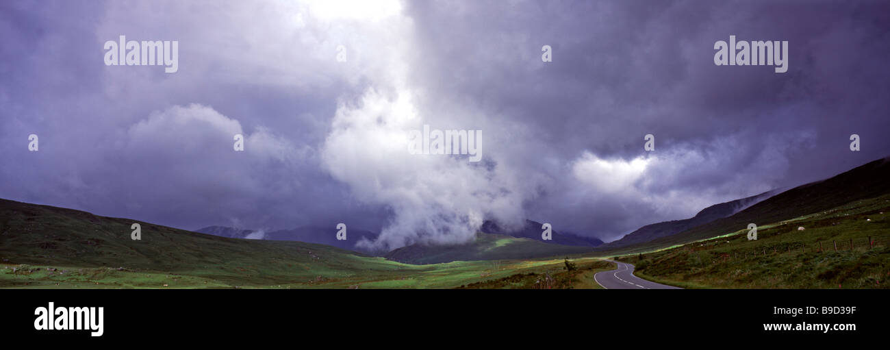 On the road from Capel Curig to Snowdon a stormy and dramatic sky Stock ...