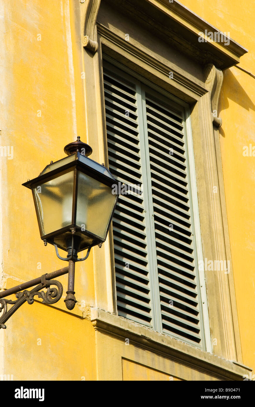 Tuscan building ochre facade in Florence Italy Stock Photo - Alamy