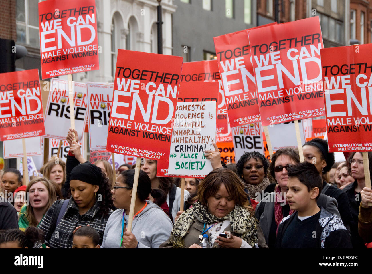 Women's protest through central London against domestic violence Stock ...