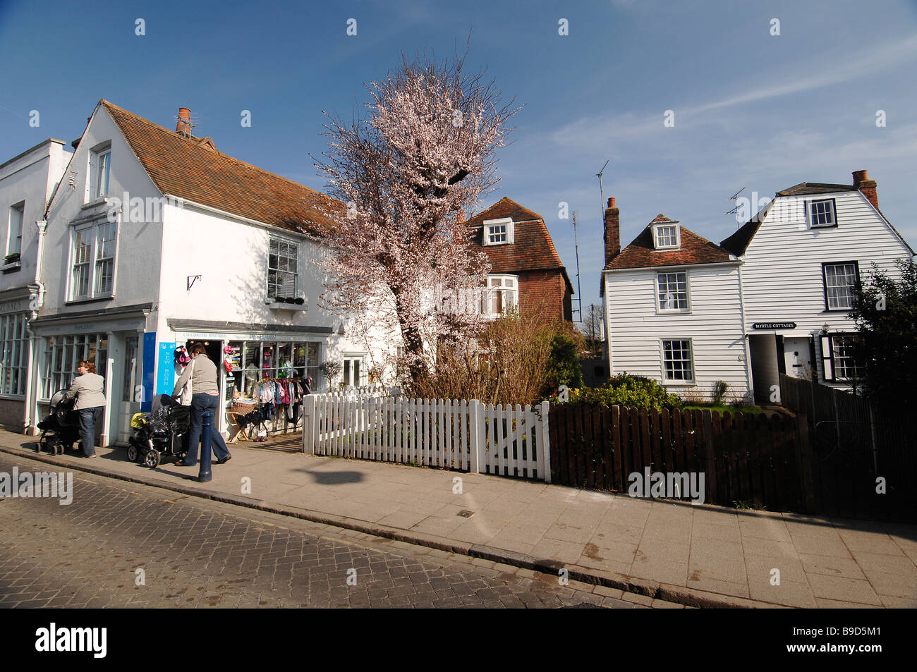 harbour street whitstable white shutter board houses Stock Photo - Alamy