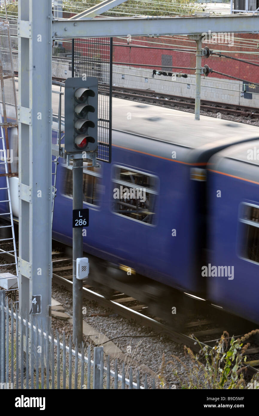 A train passing signal lights Stock Photo - Alamy