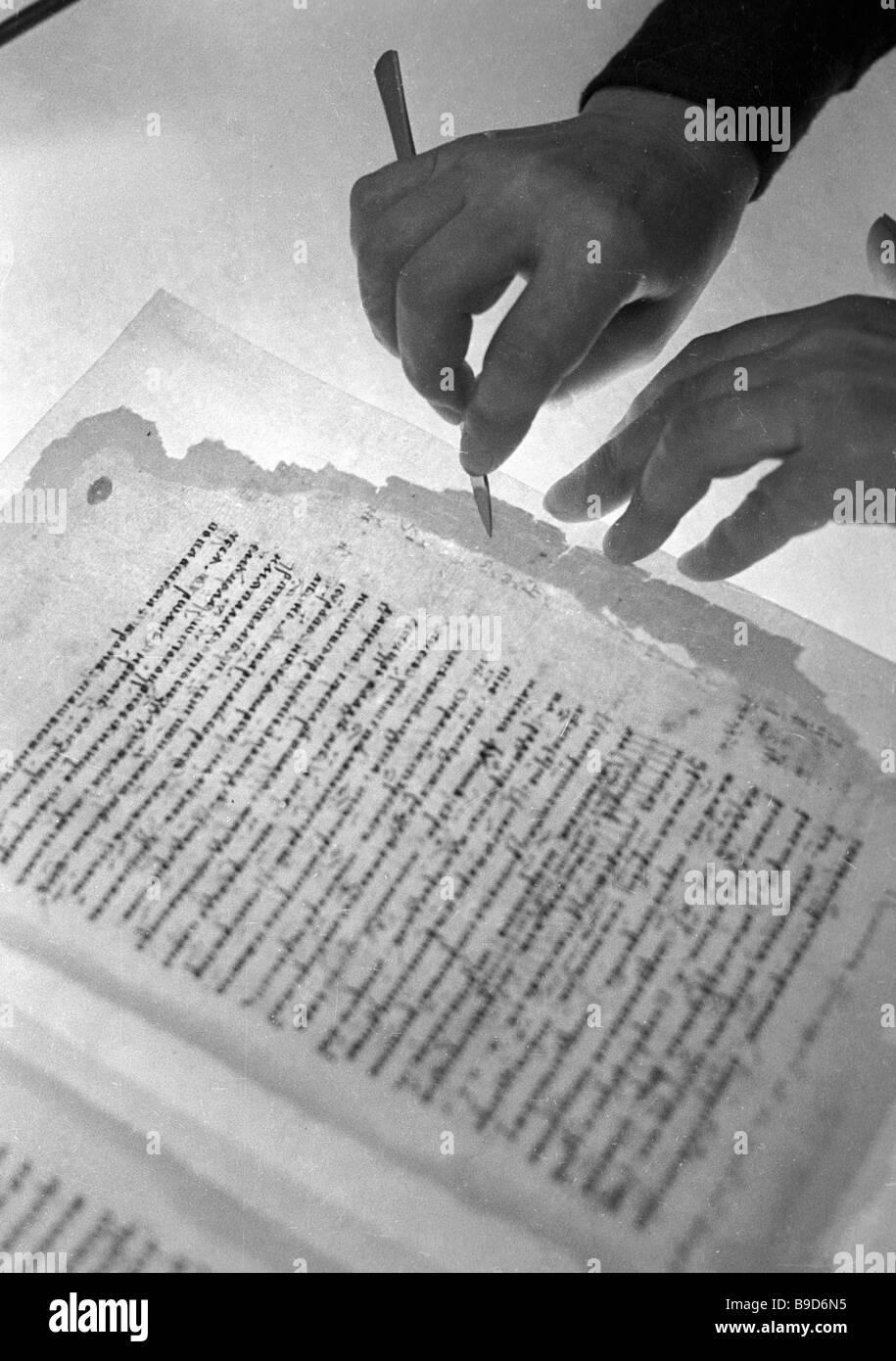Expert restores ancient manuscript at Vladimir Lenin State Library ...