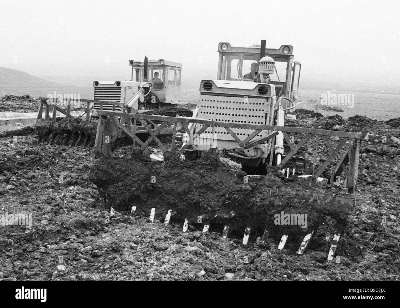 Removing stones from new lands Stock Photo - Alamy